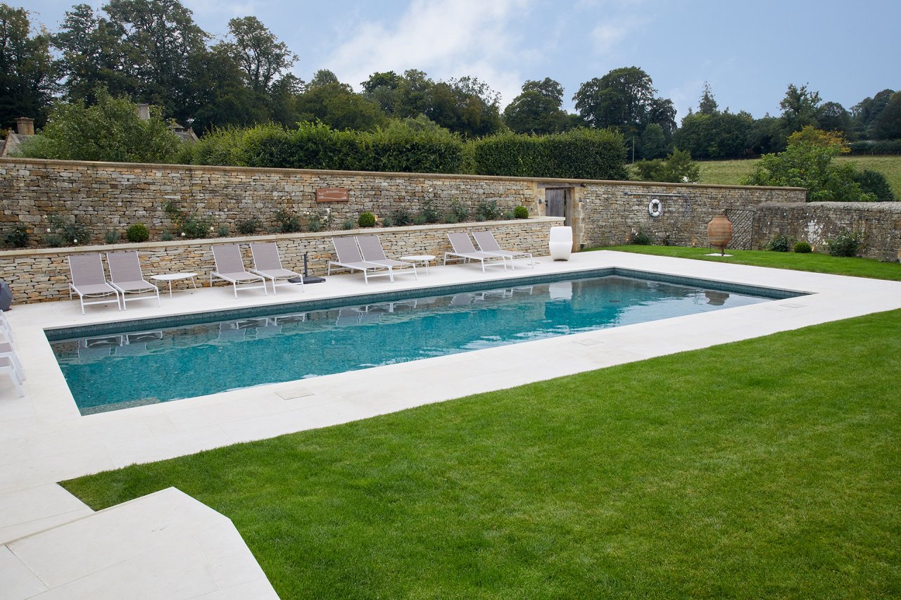 Luxury Outdoor Swimming Pool in Cotswolds. Design & build by Guncast