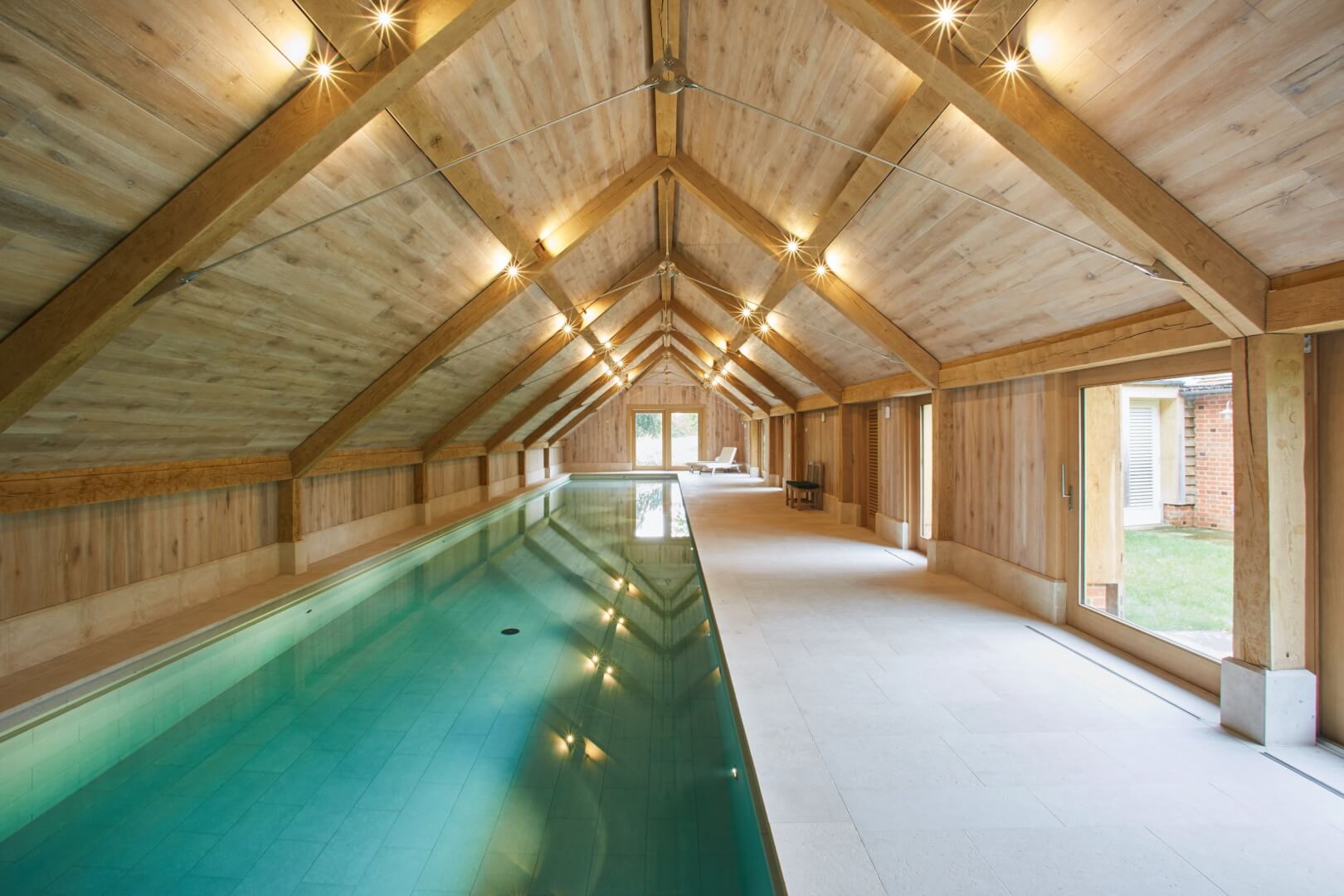 Indoor pool by Guncast for exercising in luxury home Indoor pool by Guncast for exercising in luxury home